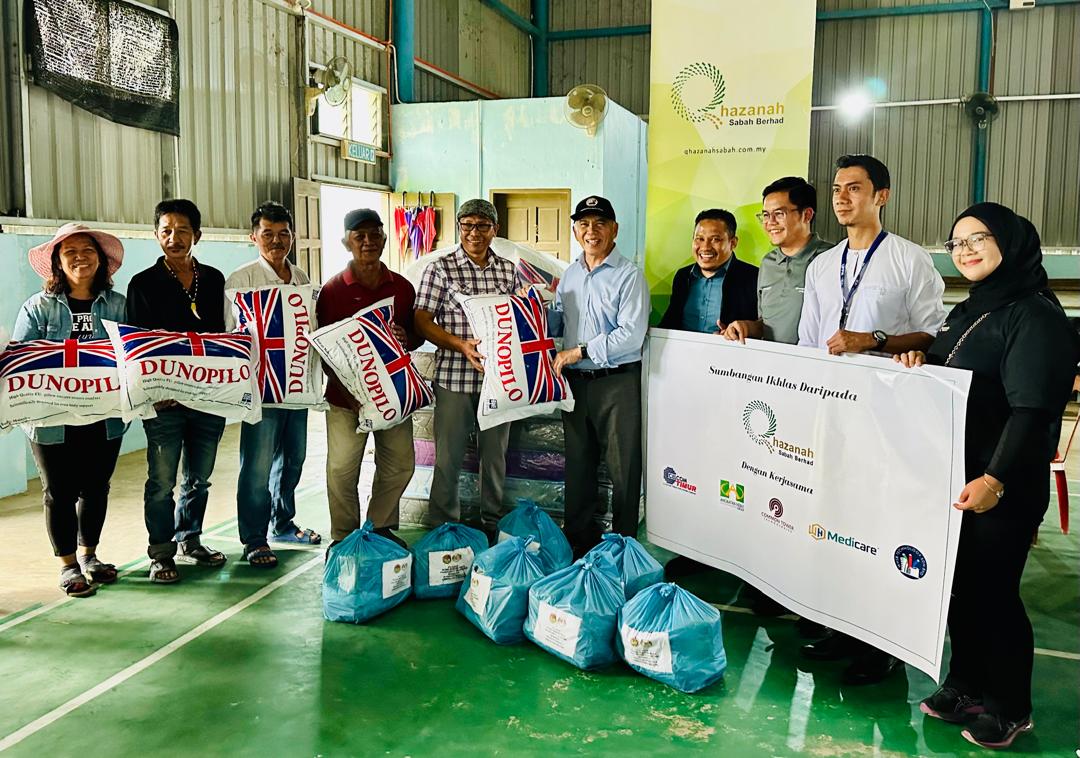 103 keluarga terjejas banjir di Sipitang terima sumbangan CSR QSB | Sabah Media